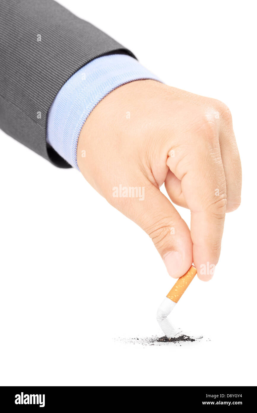 Male hand quitting smoking cigarette, isolated on white background ...