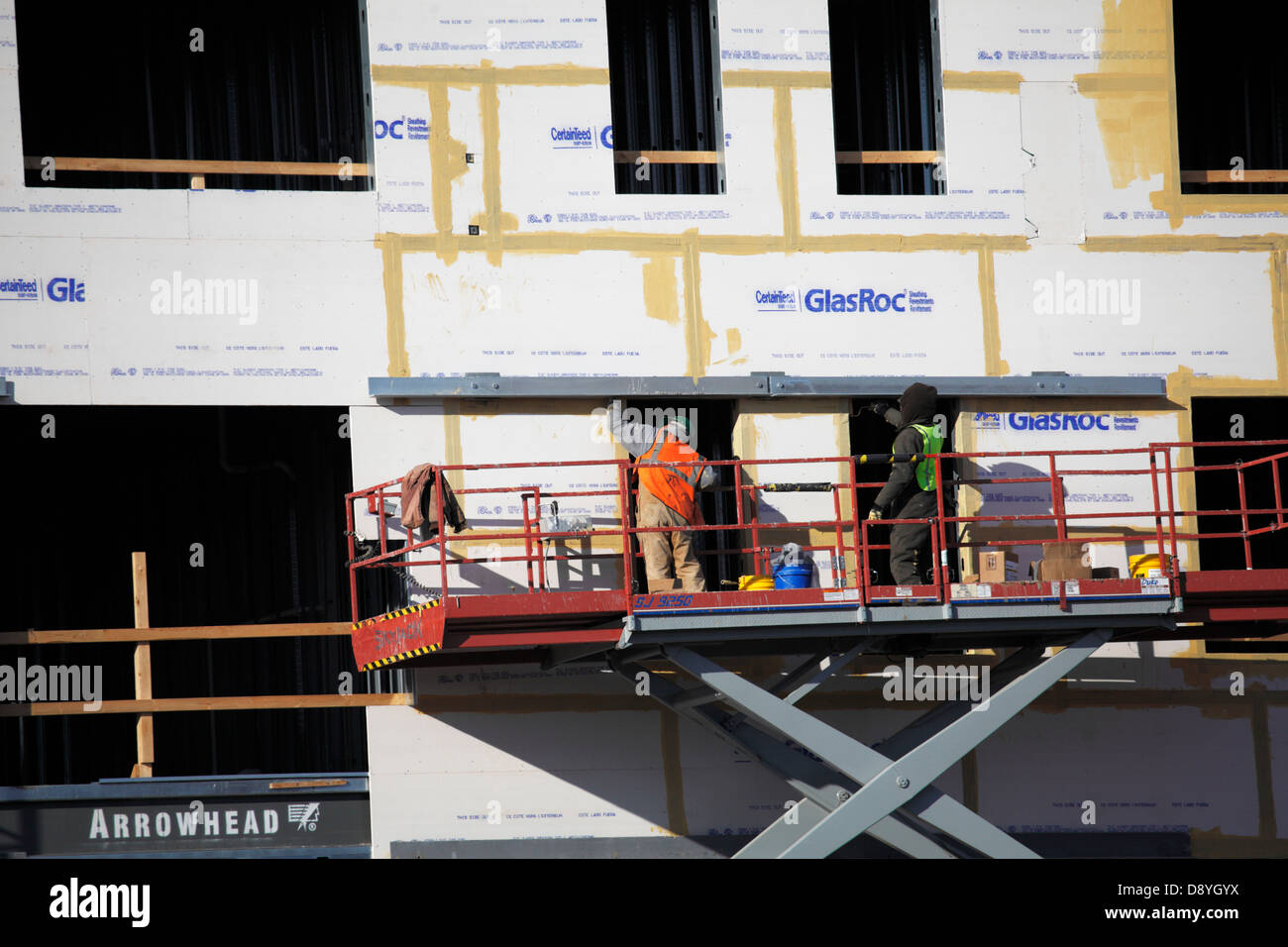 Three men building hi-res stock photography and images - Alamy