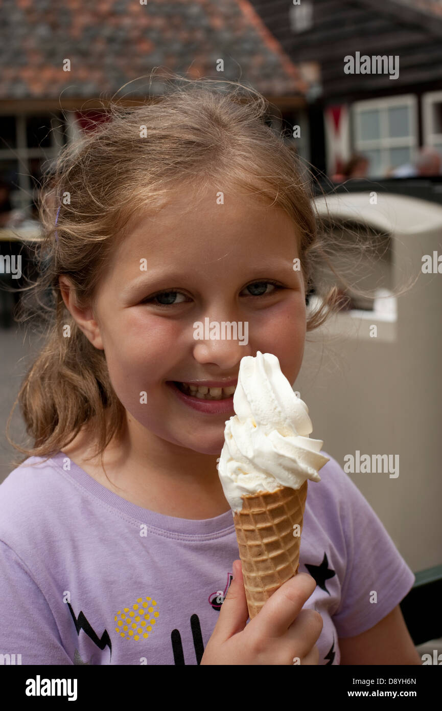 Young girl happy smiling with Ice Cream Cone FULLY MODEL RELEASED Stock ...