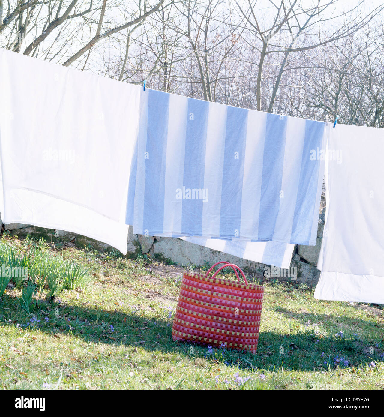 Bedclothes on a clothes line, Skane, Sweden Stock Photo - Alamy