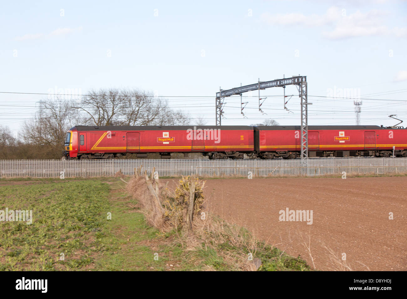A Royal Mail train on the electrified West Coast Main Line railway in ...