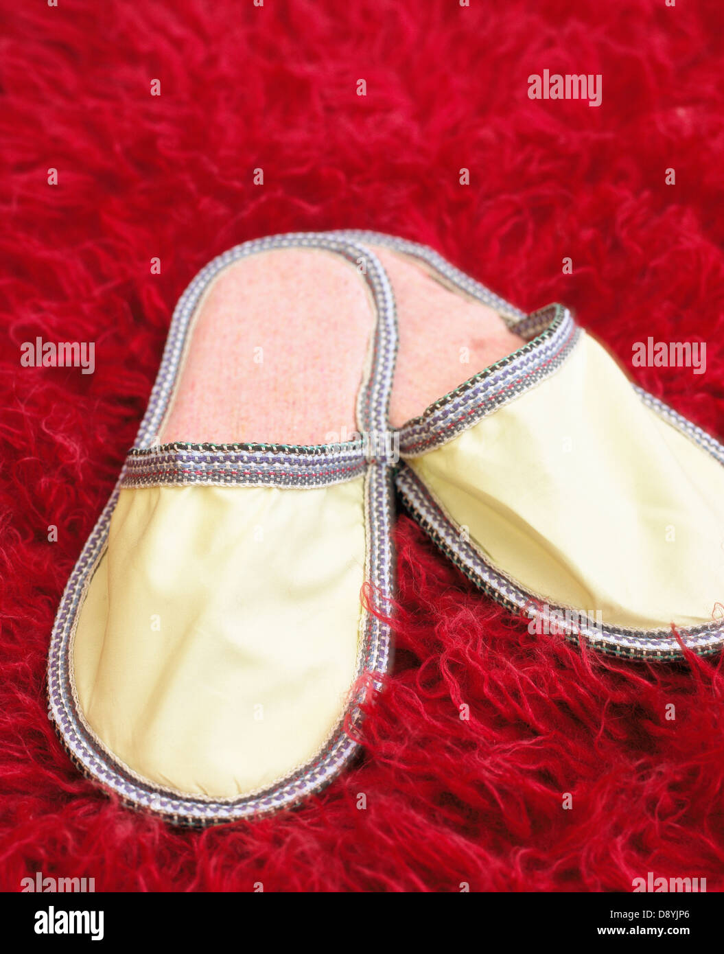 Slippers on a carpet Stock Photo - Alamy
