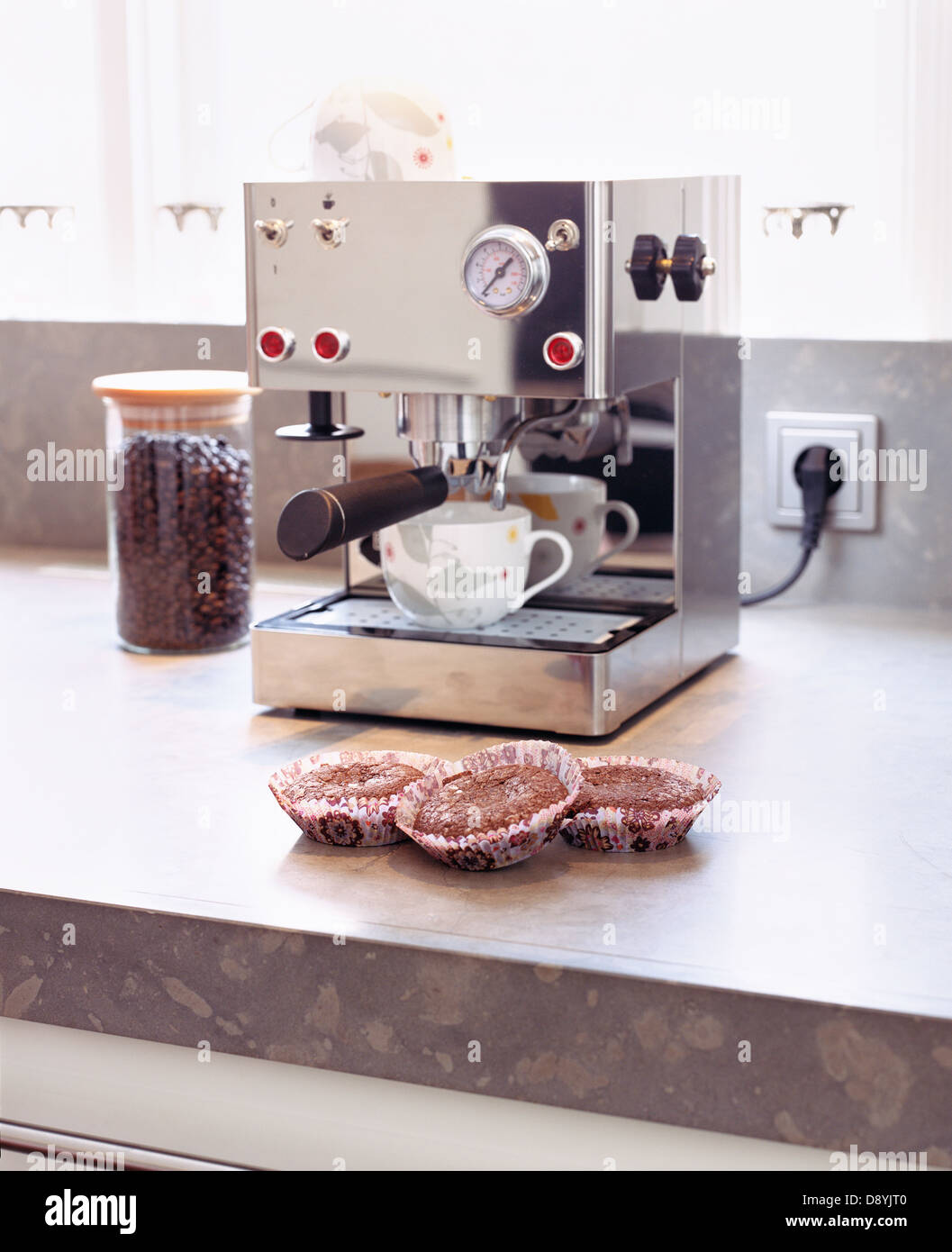 An espresso machine in a kitchen Stock Photo - Alamy