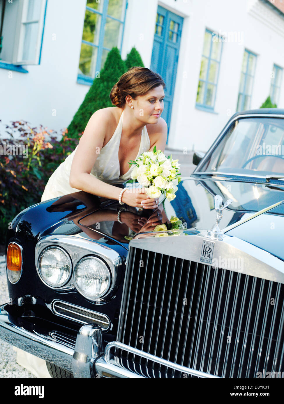 A woman standing by a car, Sweden Stock Photo - Alamy