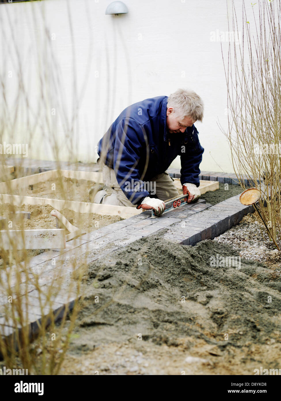 A man building a house, Sweden Stock Photo - Alamy