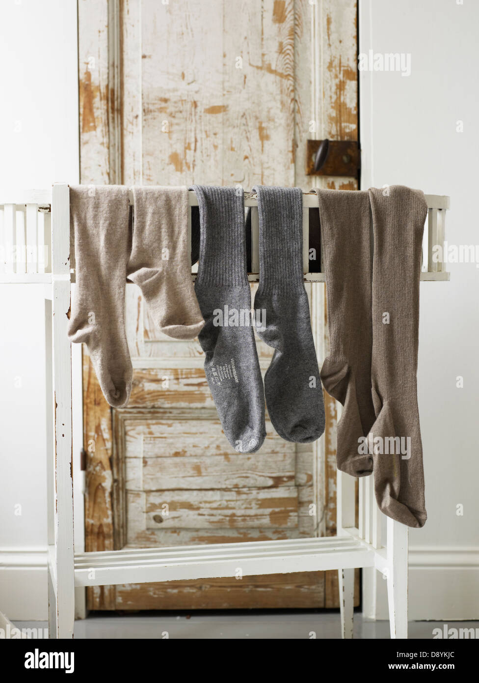 Socks hanging on rack Stock Photo - Alamy