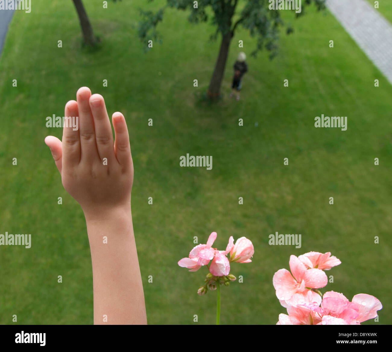 Hand waving hi-res stock photography and images - Alamy
