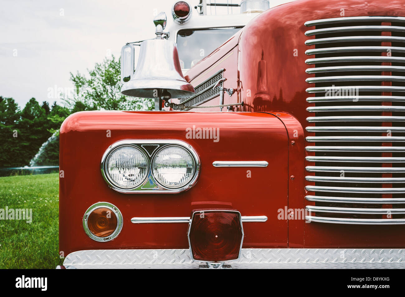 Front view of the grill, lights, and bell from a vintage fire engine ...