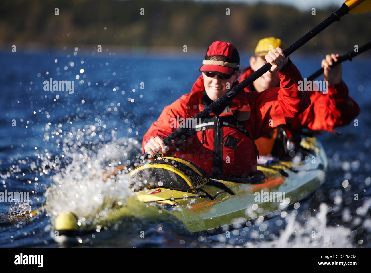 Two people canoeing, Sweden Stock Photo - Alamy