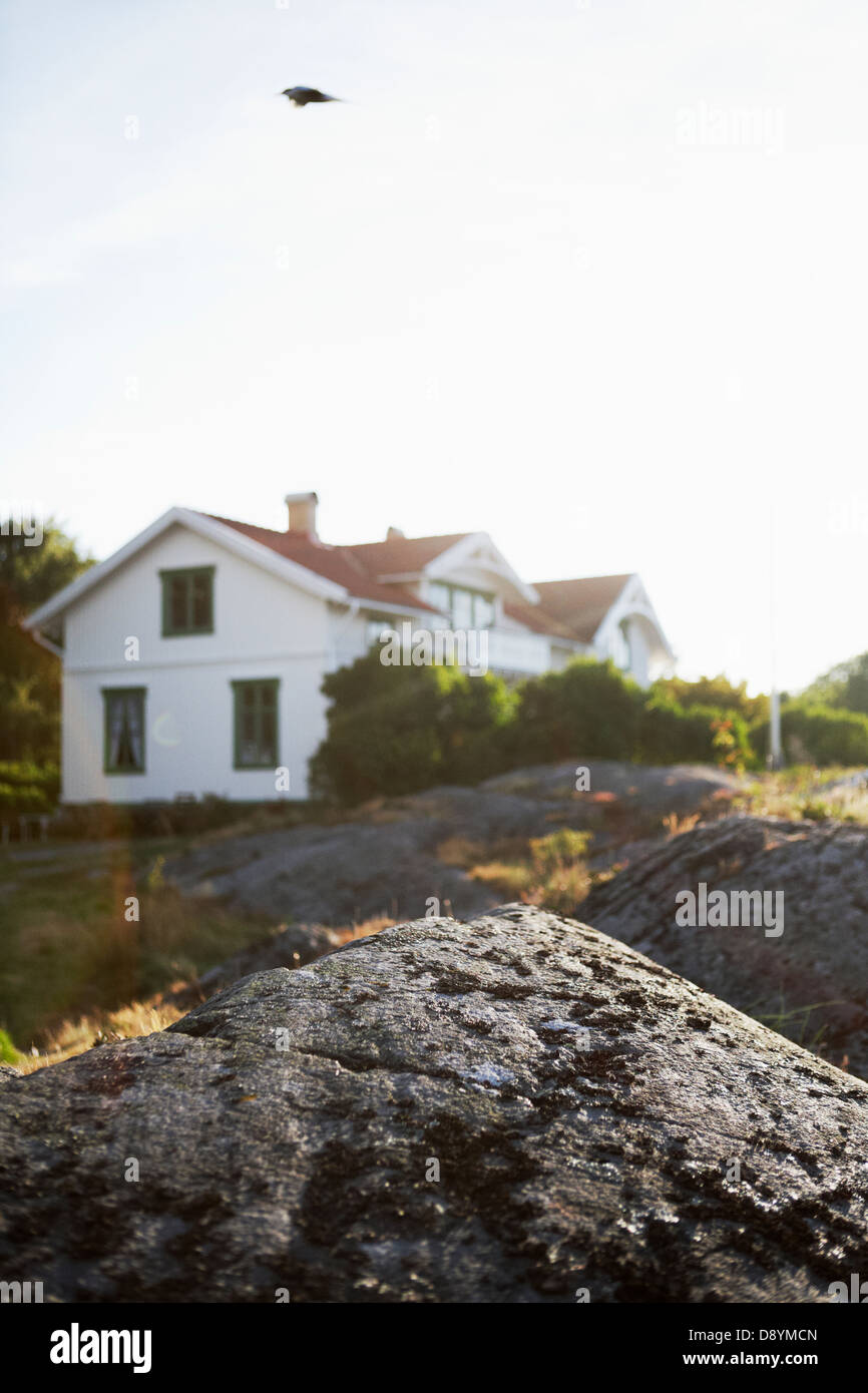 A white house on the cliffs by the sea, Sweden Stock Photo - Alamy