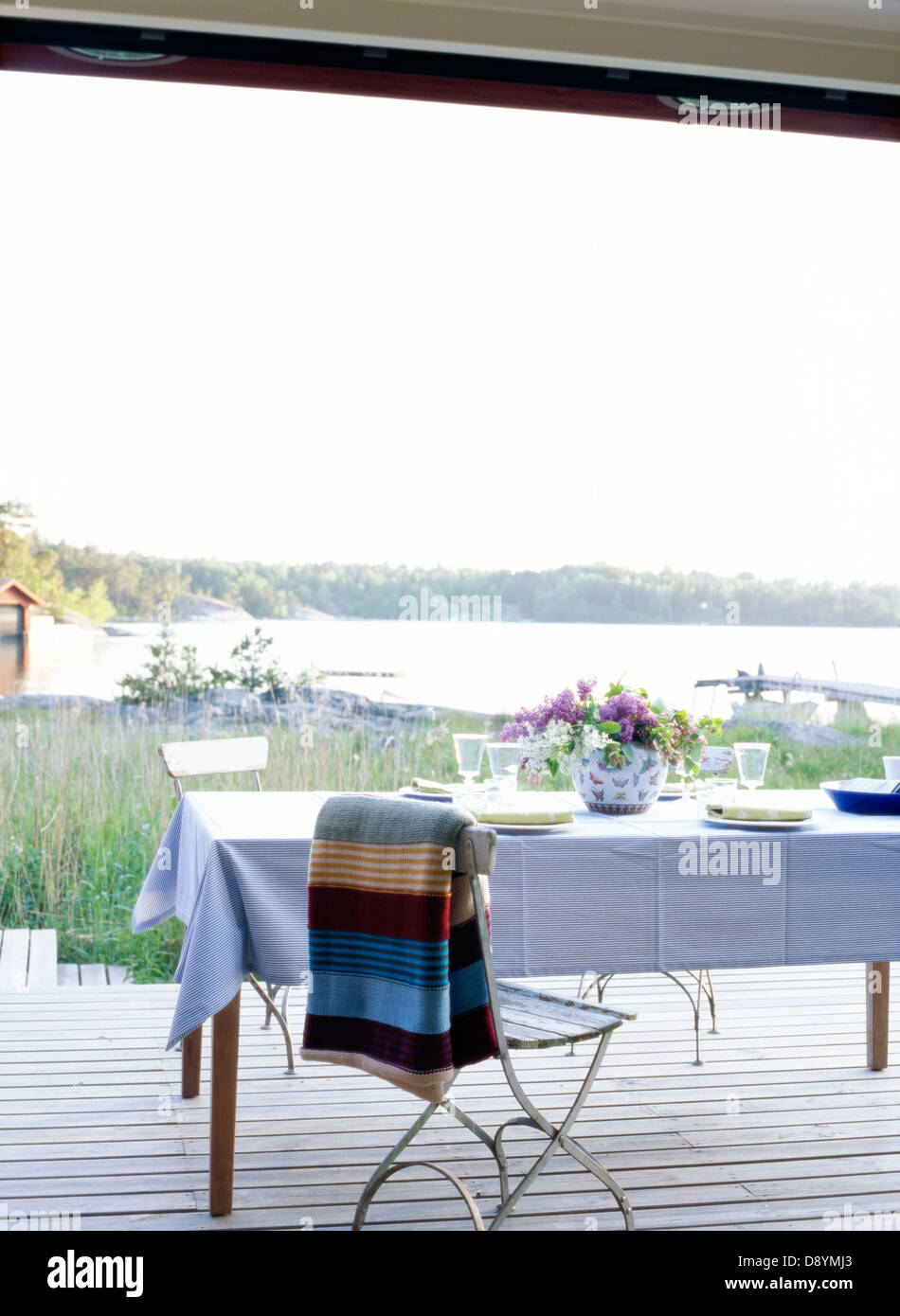Dining table in open terrace Stock Photo - Alamy