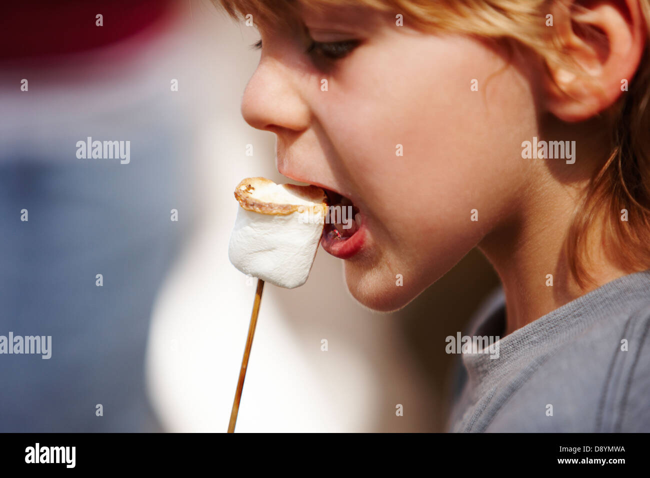 Boy with marshmallow hi-res stock photography and images - Alamy
