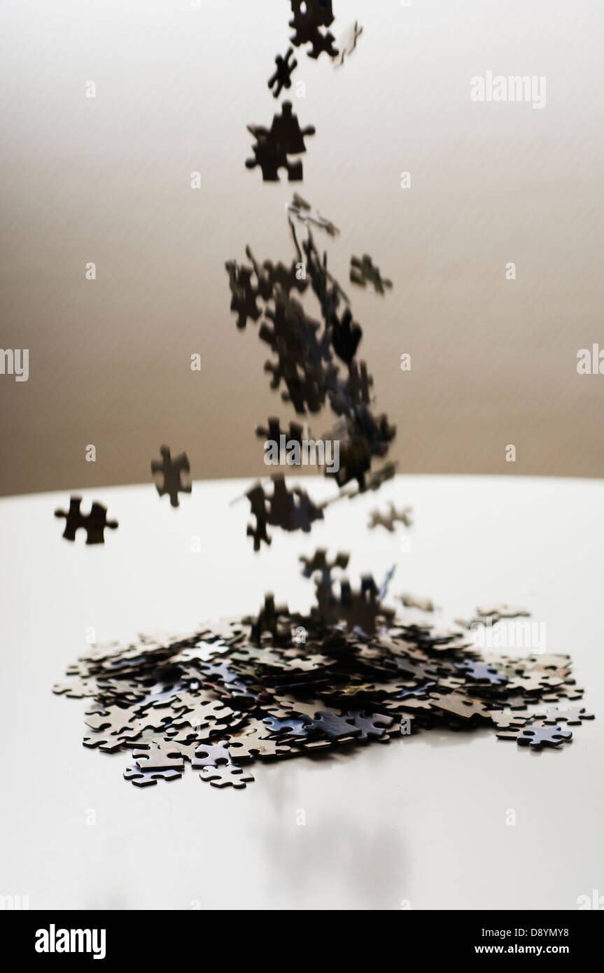 Background falling puzzle pieces hi-res stock photography and images ...