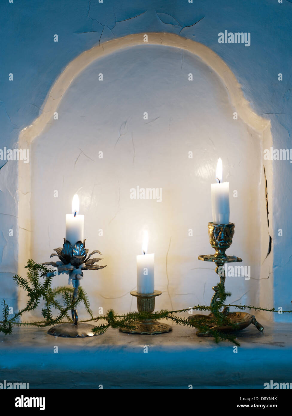 Three lighten candles Stock Photo - Alamy
