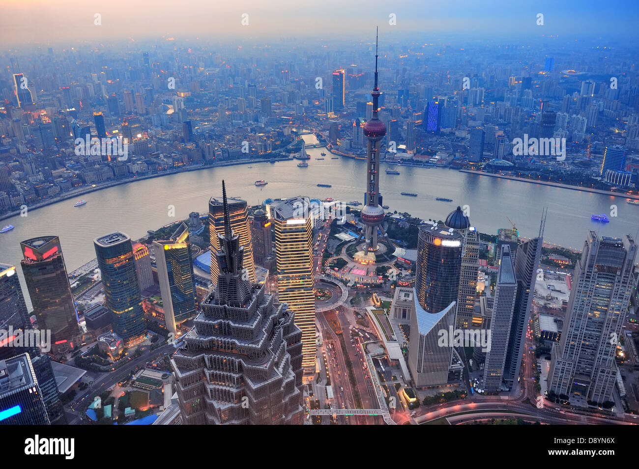 Shanghai aerial view at sunset with urban skyscrapers over river Stock ...