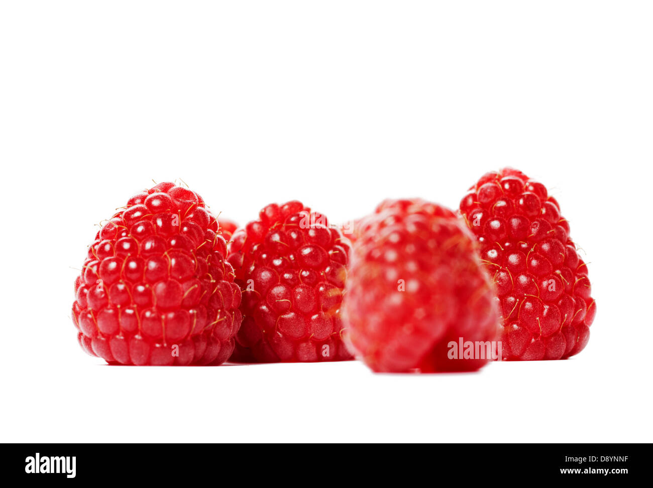Four raspberries, studio shot Stock Photo - Alamy