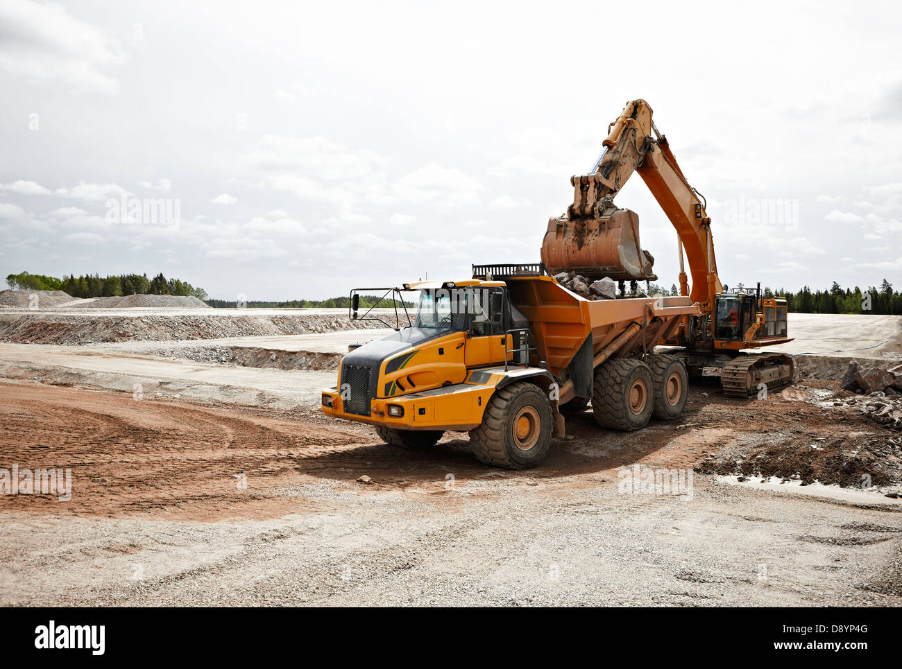 Excavator at construction site Stock Photo - Alamy