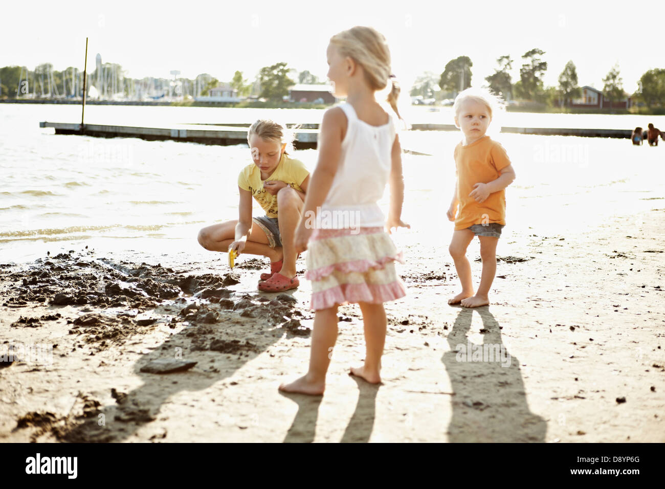 Children playing on beach Stock Photo - Alamy