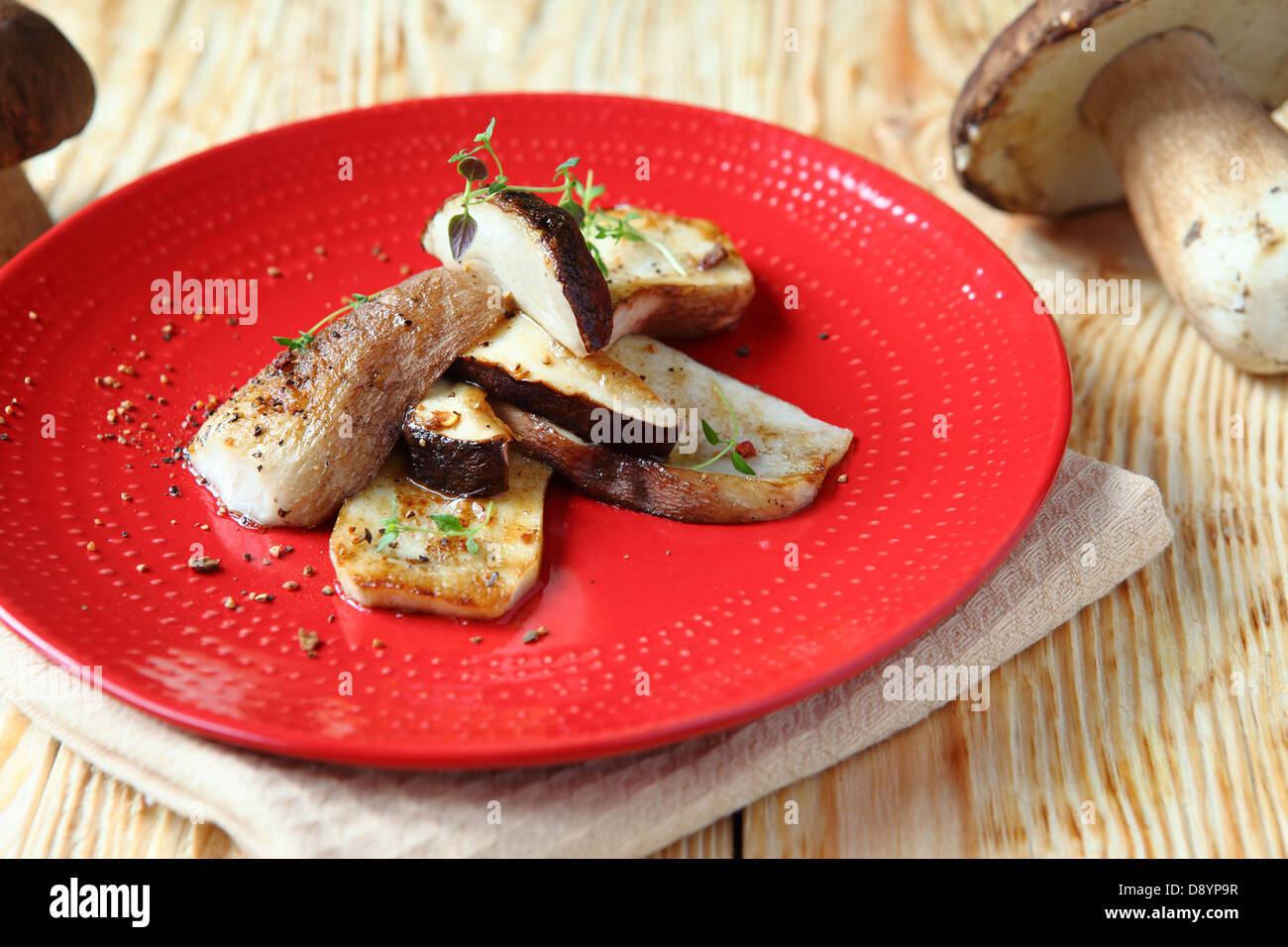 grilled boletus mushroom halves, food Stock Photo - Alamy