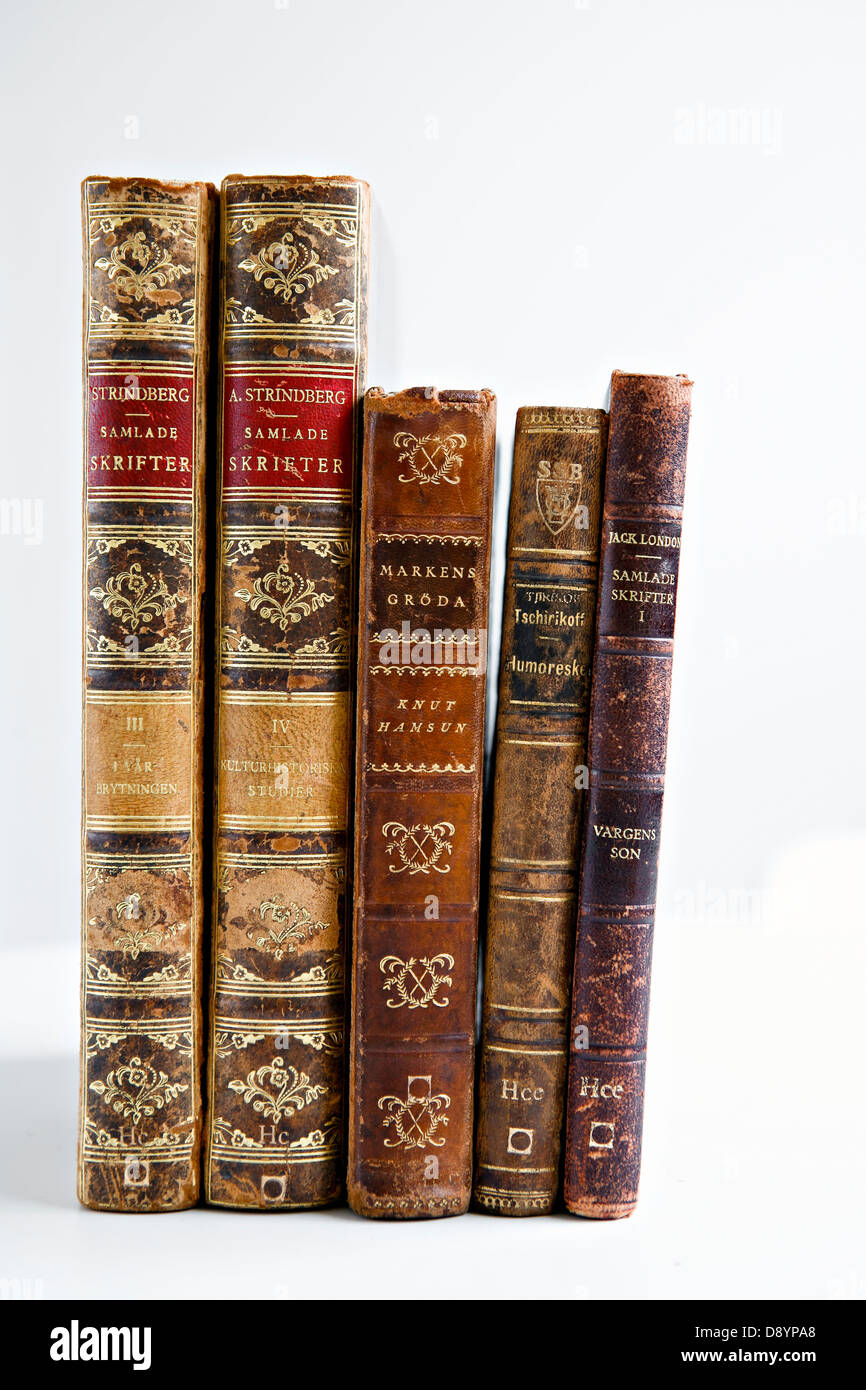 Five old books in row Stock Photo - Alamy