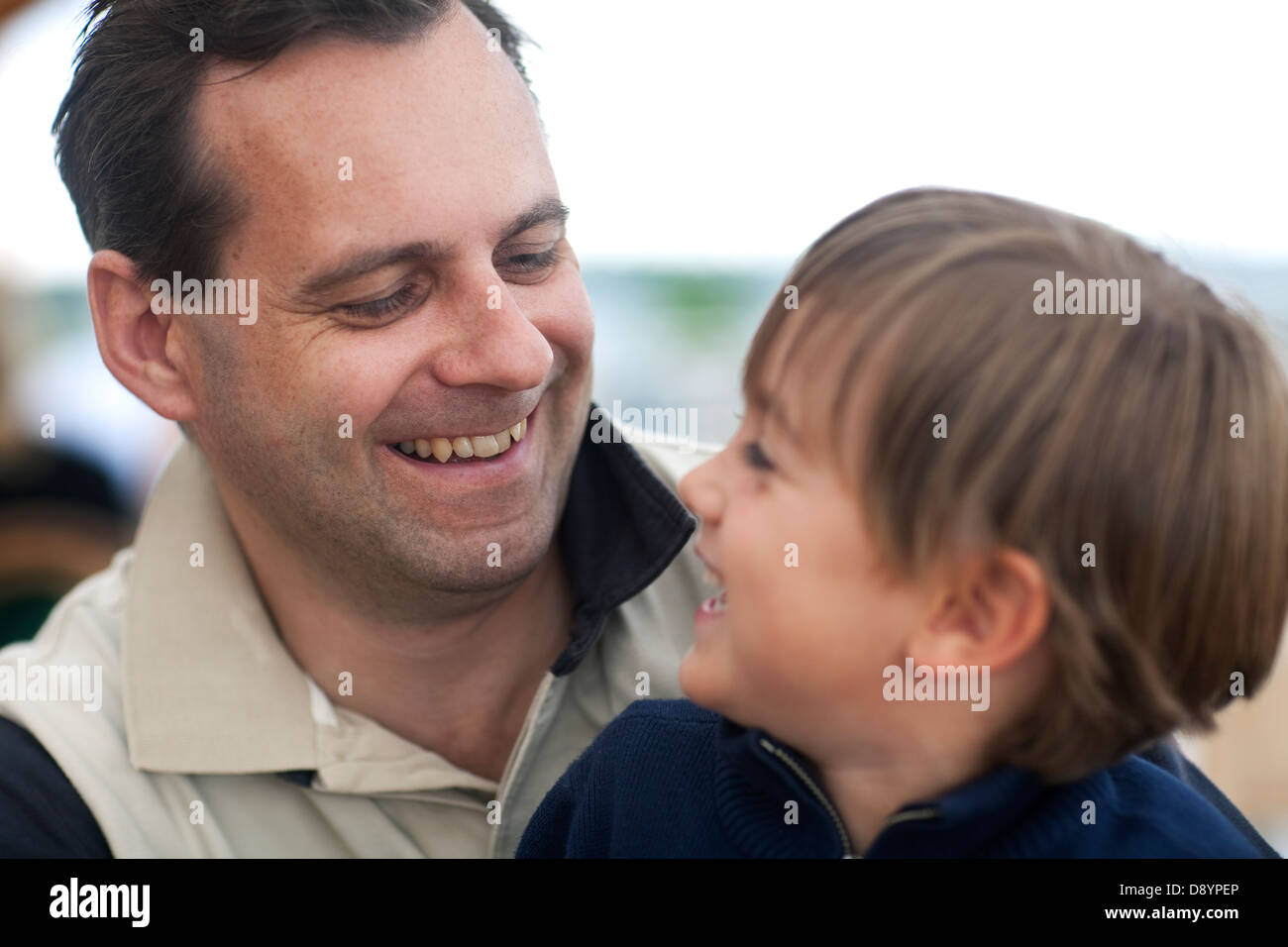 Father and son laughing Stock Photo - Alamy