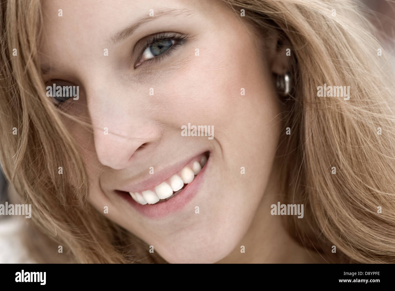 Young woman smiling, close-up Stock Photo - Alamy