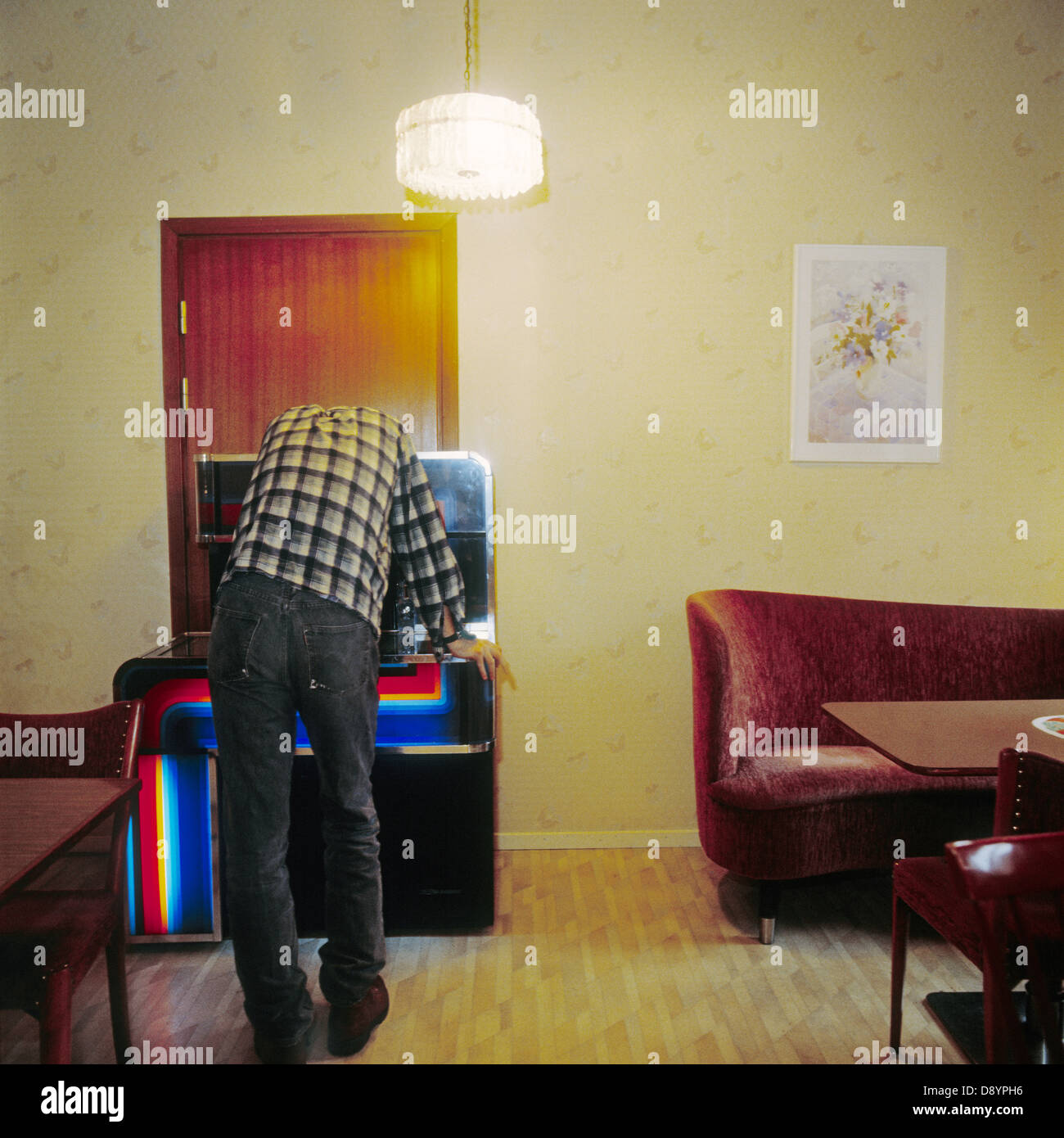 Man playing pinball hi-res stock photography and images - Alamy