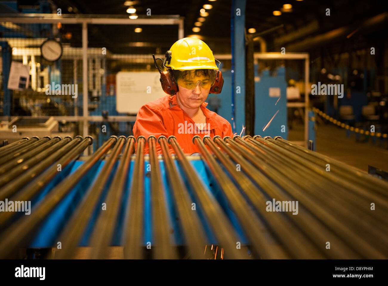 Woman working in factory Stock Photo - Alamy