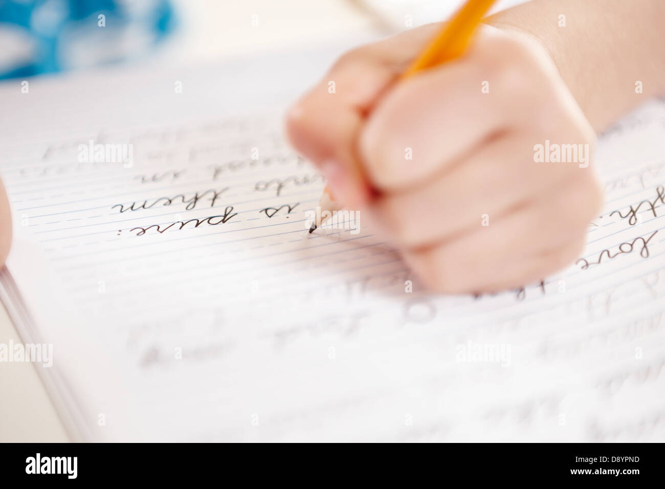 Girls hand holding pen writing hi-res stock photography and images - Alamy