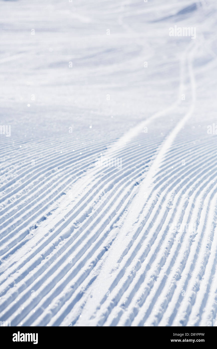 Ski track through snow Stock Photo - Alamy