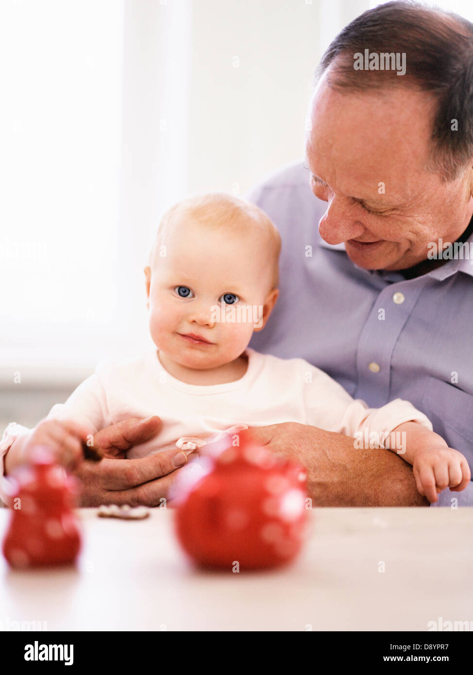 A man with a baby Stock Photo - Alamy