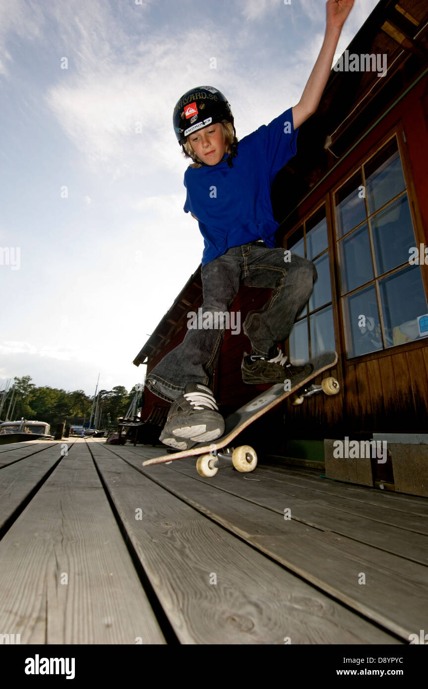 A boy on a skateboard Stock Photo - Alamy