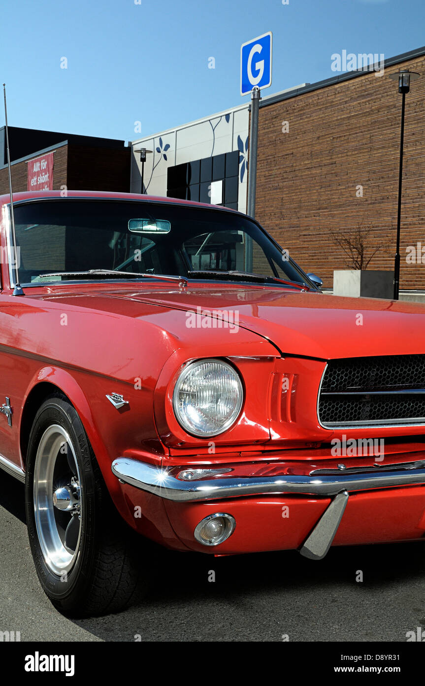 Red car on street Stock Photo - Alamy