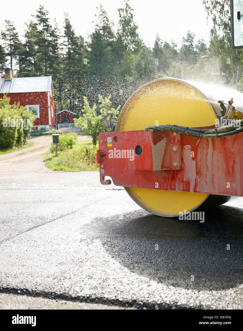 Steamroller paving asphalt road Stock Photo - Alamy