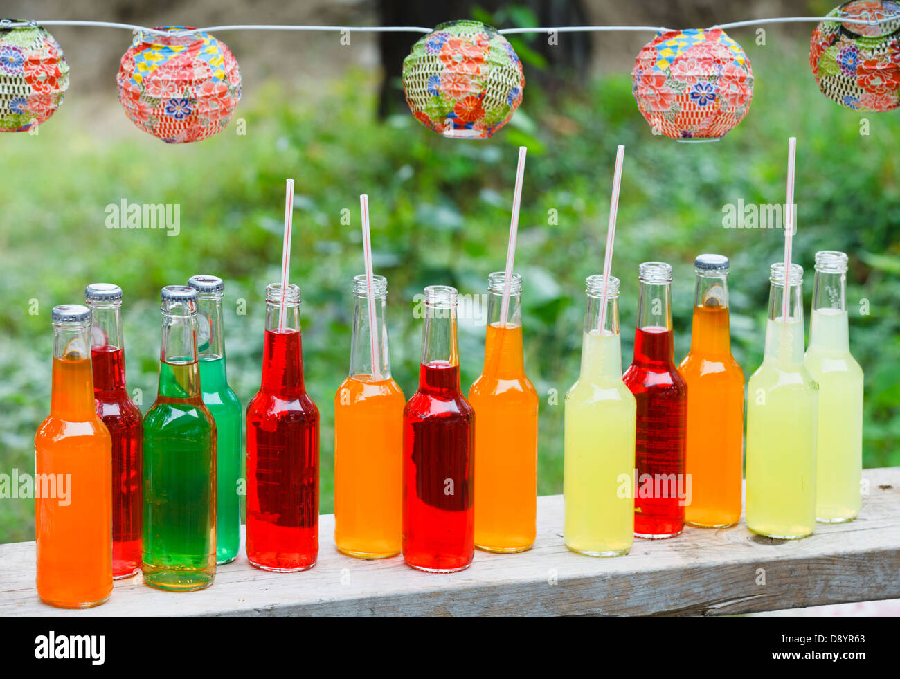 Bottles of coloured cold drink Stock Photo - Alamy