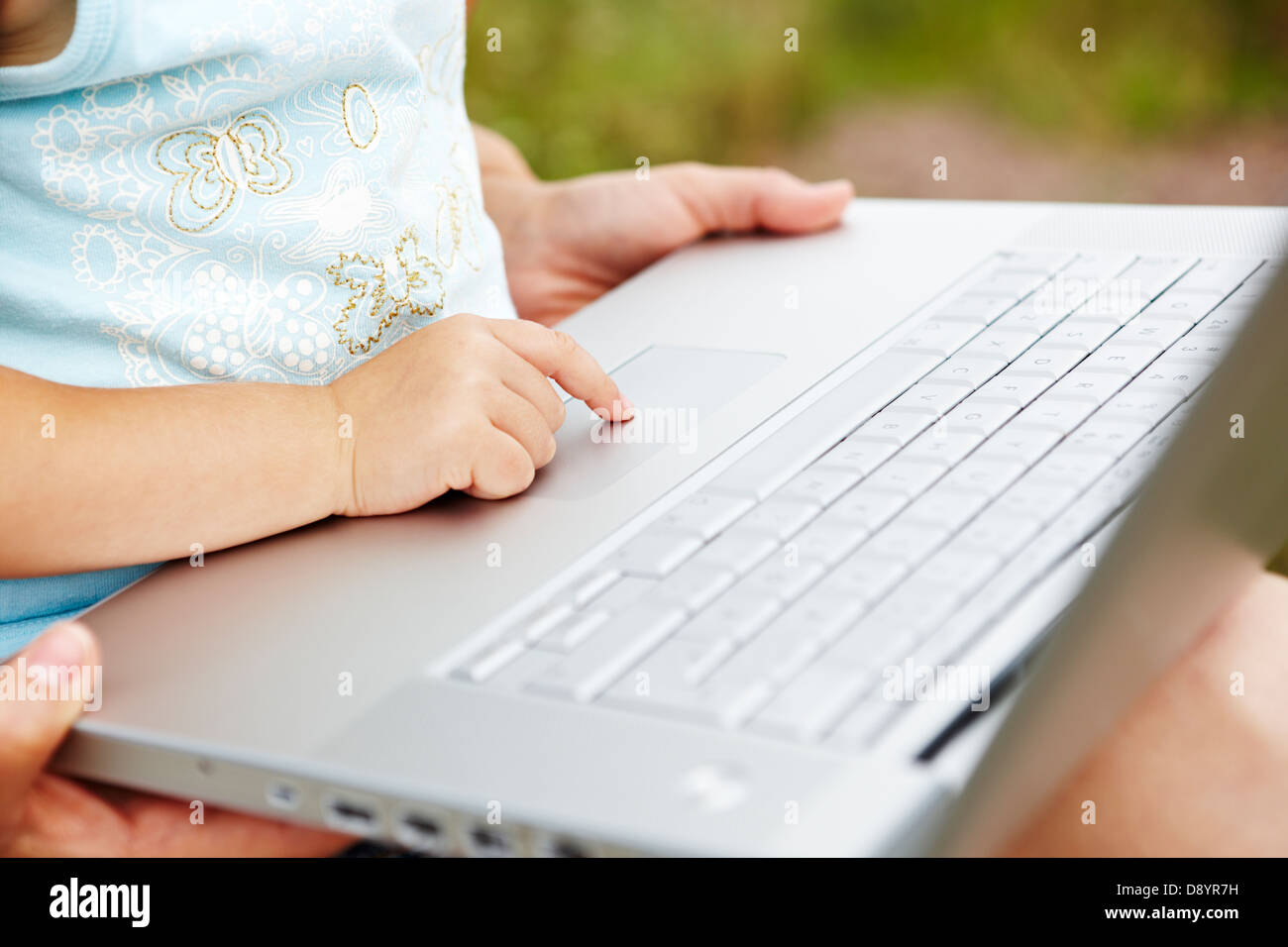 Girl using laptop Stock Photo - Alamy