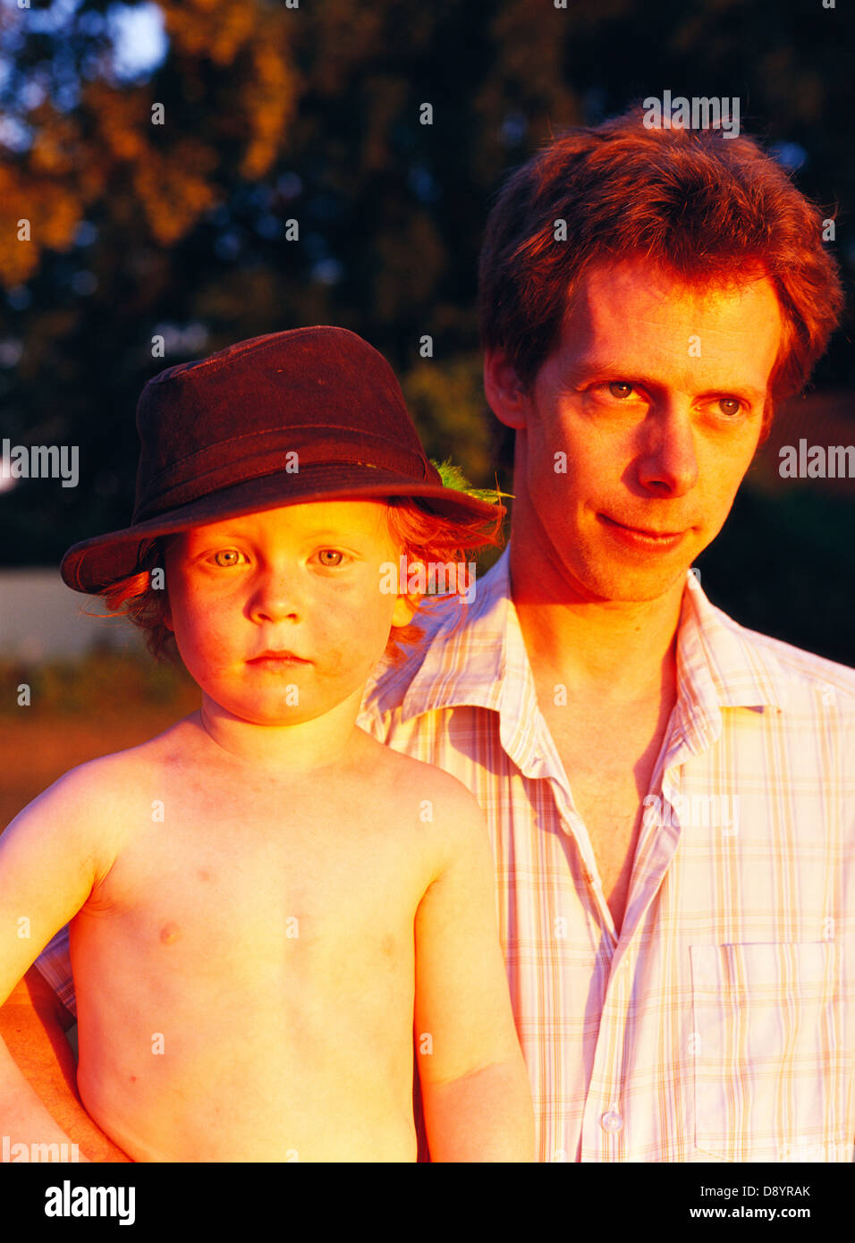 Portrait of a father with his son Stock Photo - Alamy