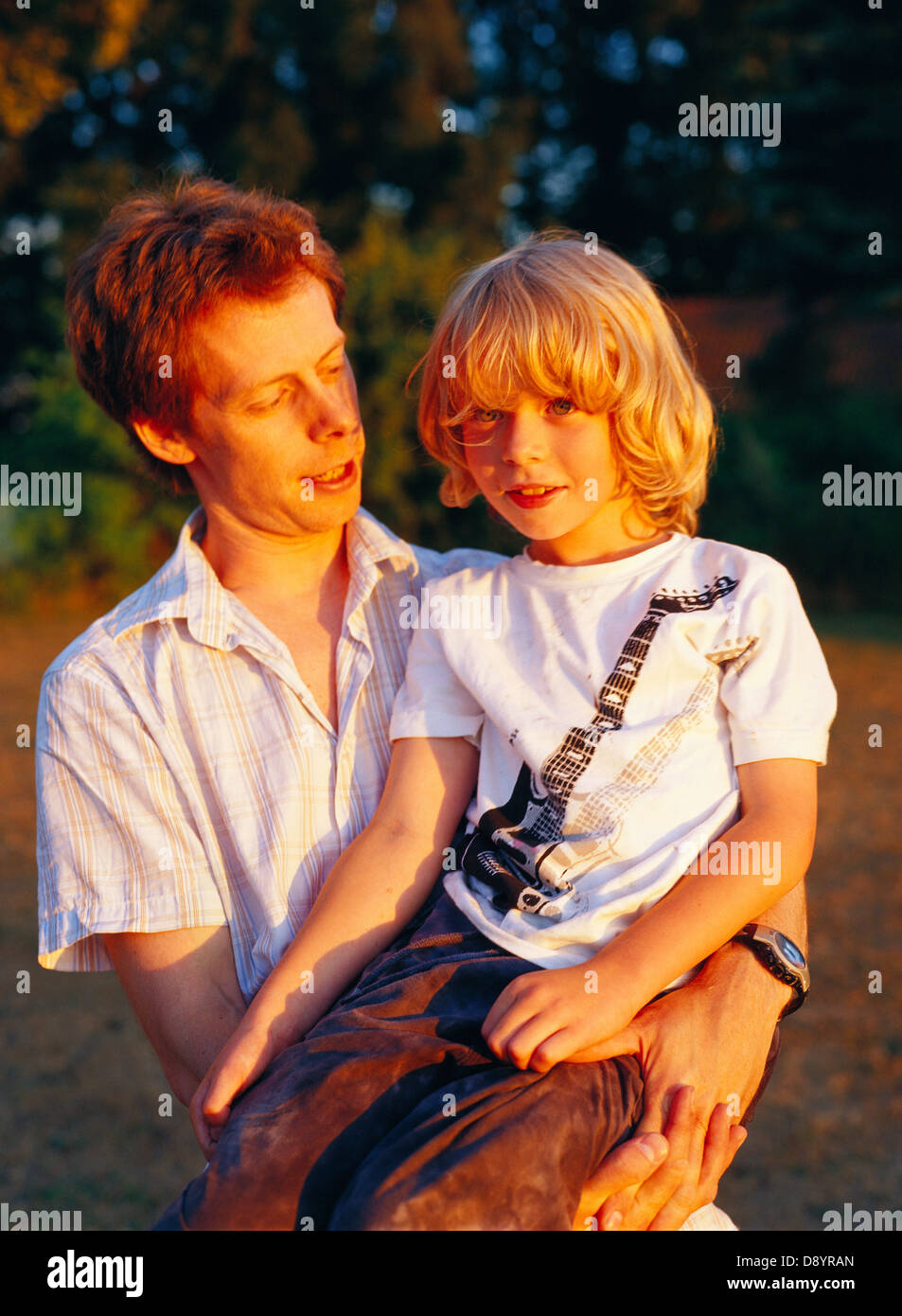 Portrait of a father with his son Stock Photo - Alamy