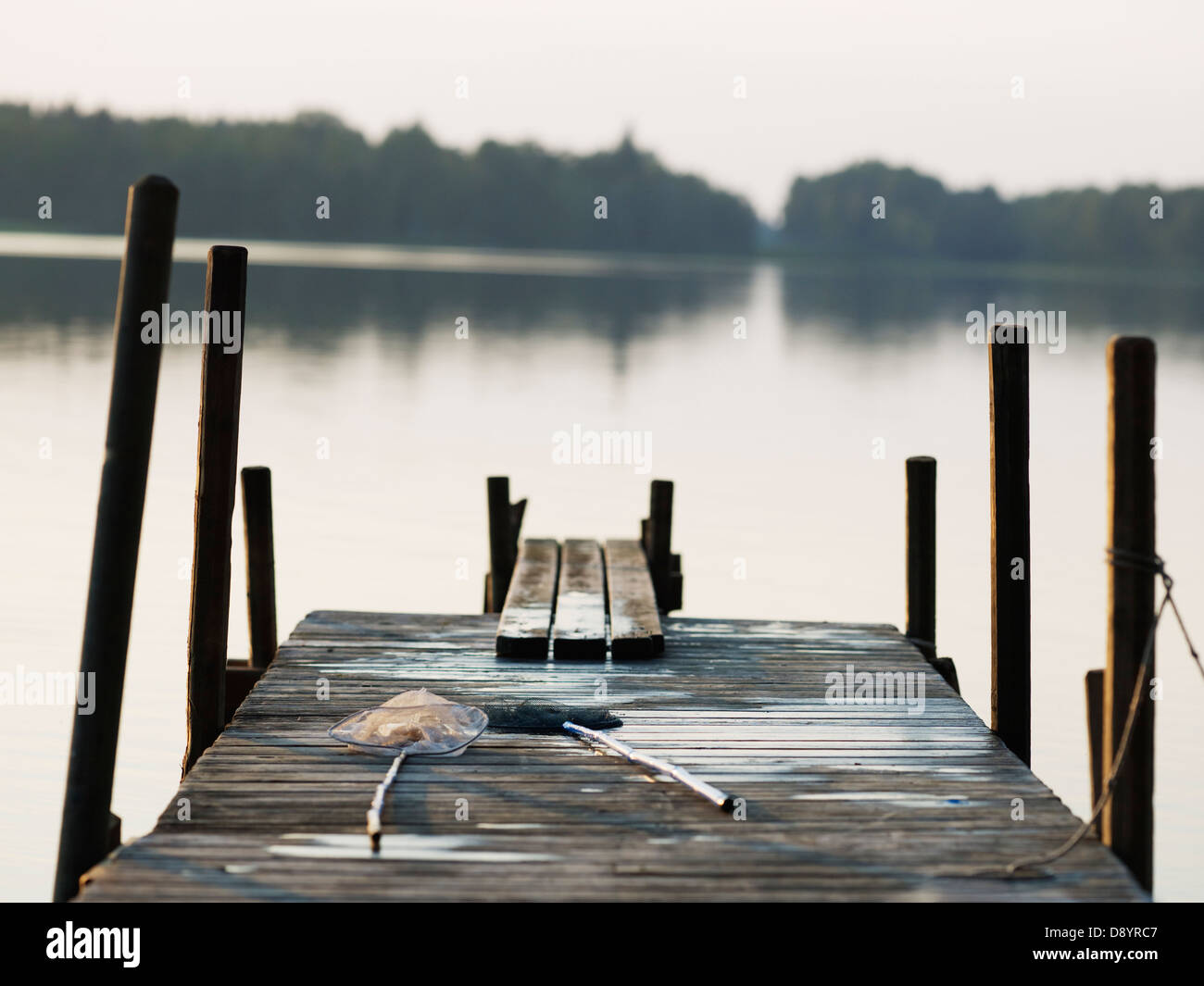 Fishing net on jetty Stock Photo - Alamy