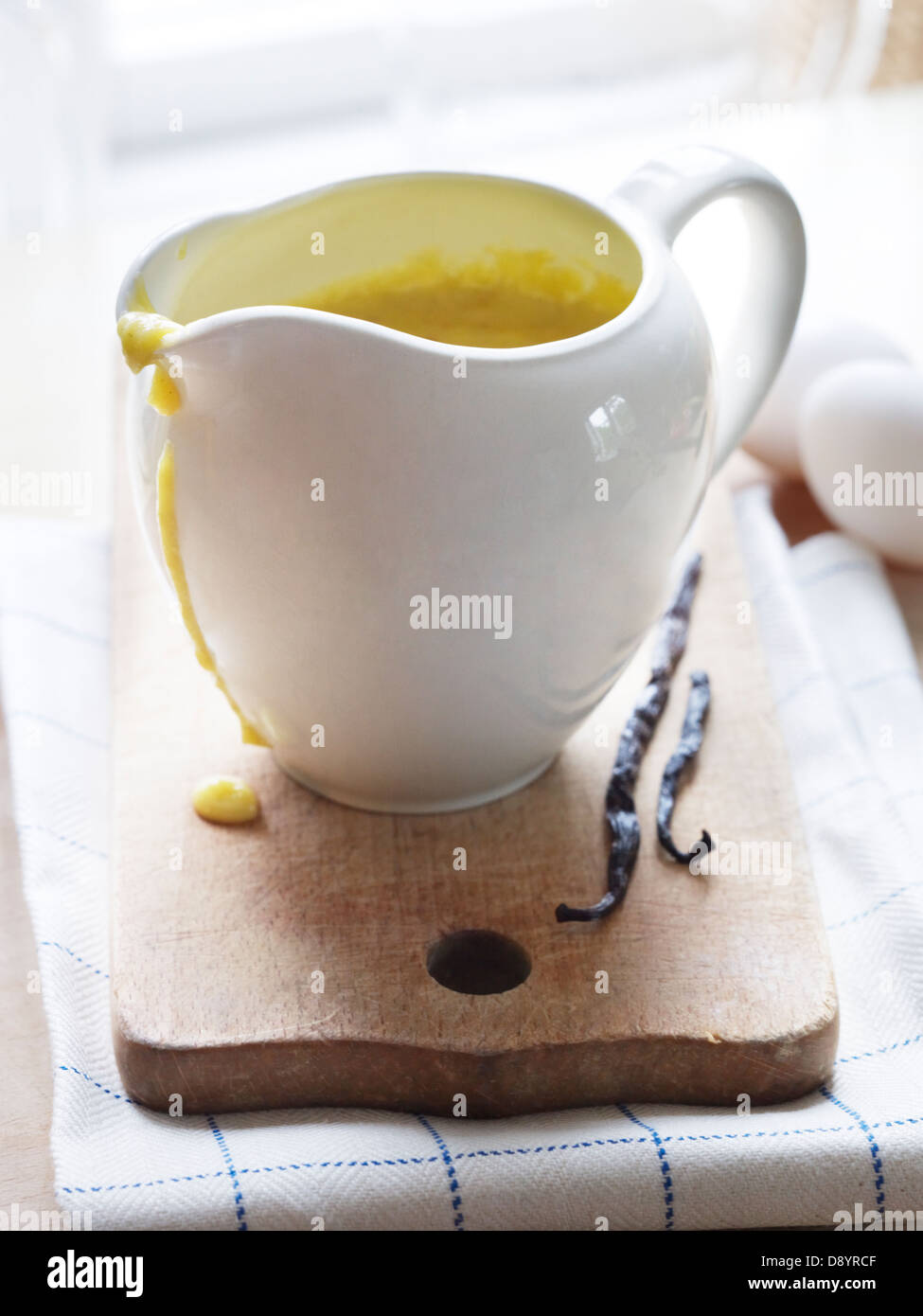 Pot with vanilla custard Stock Photo - Alamy