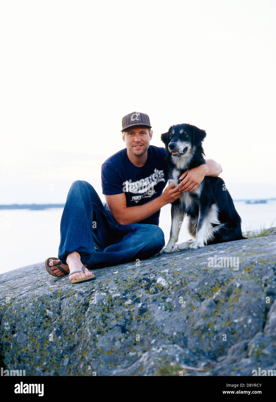 Portrait of a man with his dog Stock Photo - Alamy