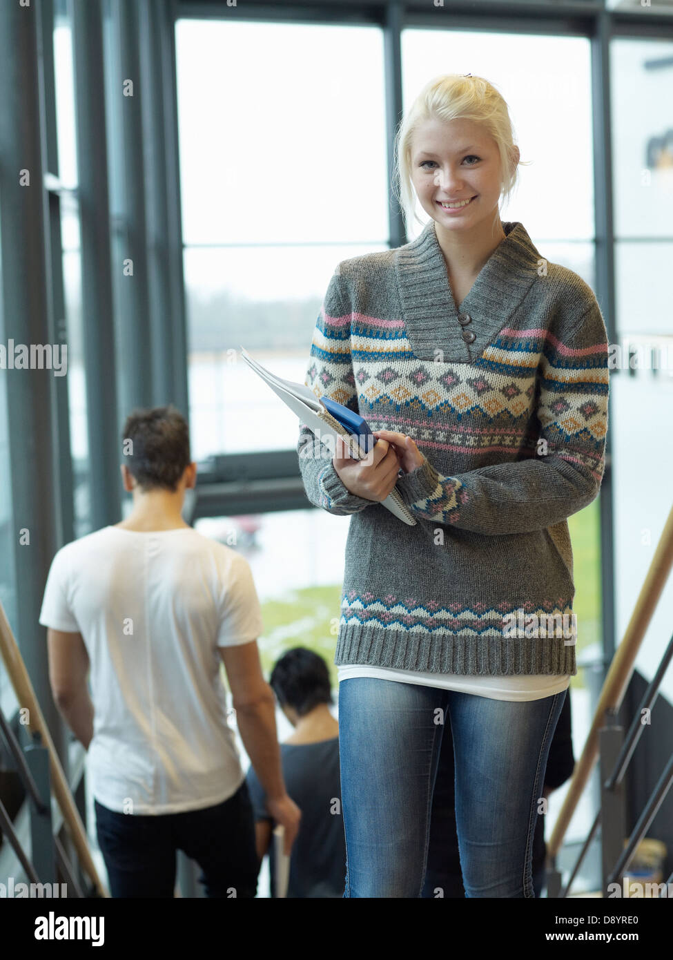 Teenage girl in corridor in school Stock Photo - Alamy