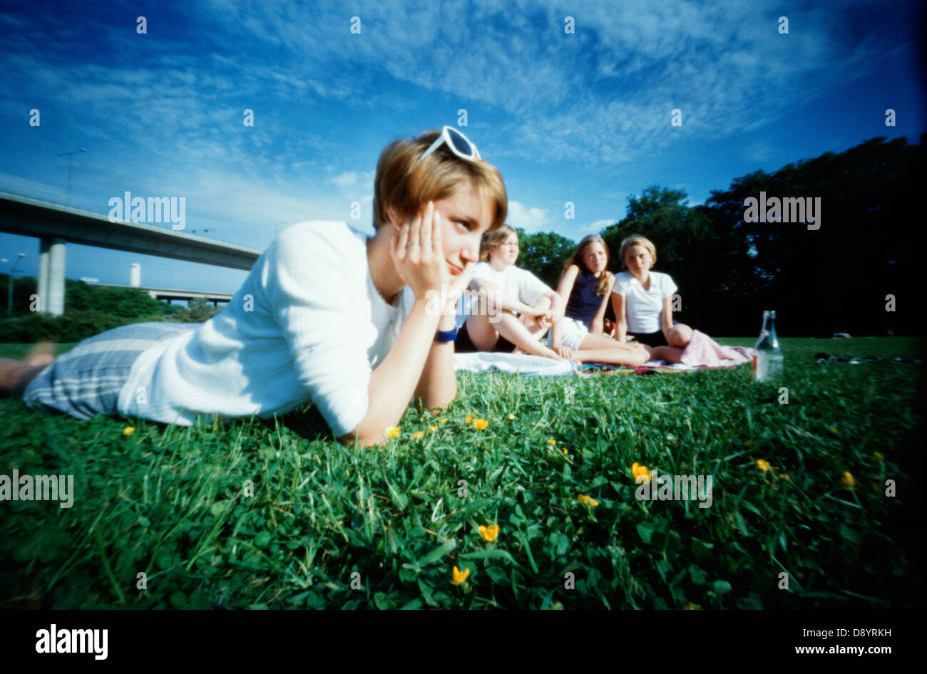 Teenage girls having a picnic Stock Photo - Alamy