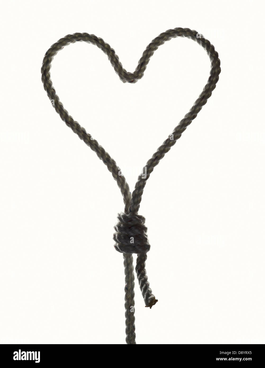 Heart shaped noose against white background Stock Photo - Alamy