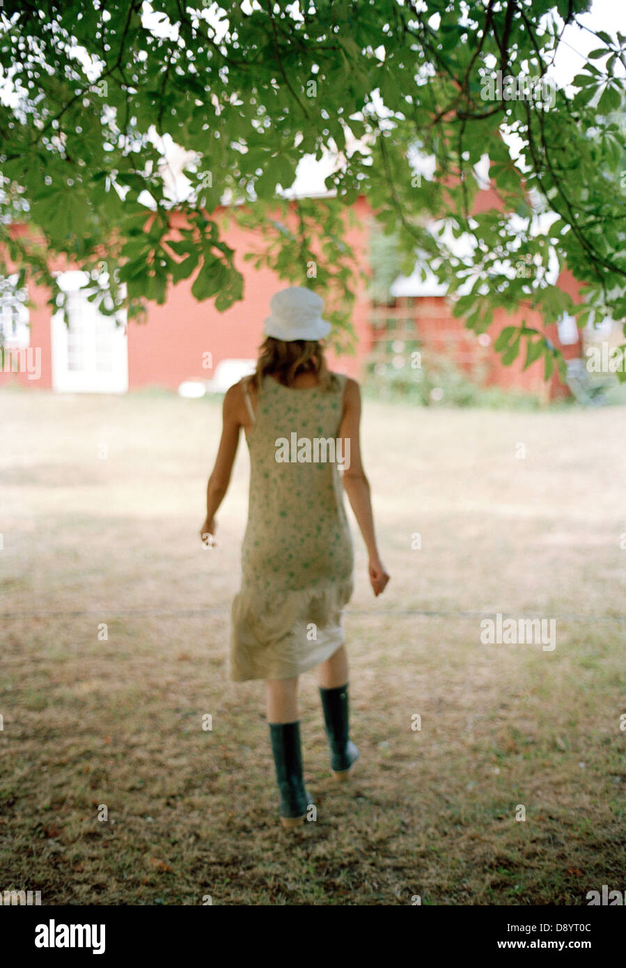 A woman walking Stock Photo - Alamy