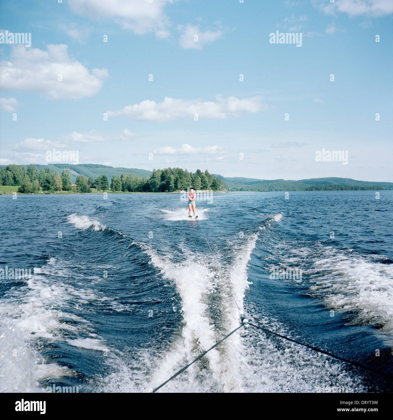 Person waterskiing on lake Stock Photo - Alamy