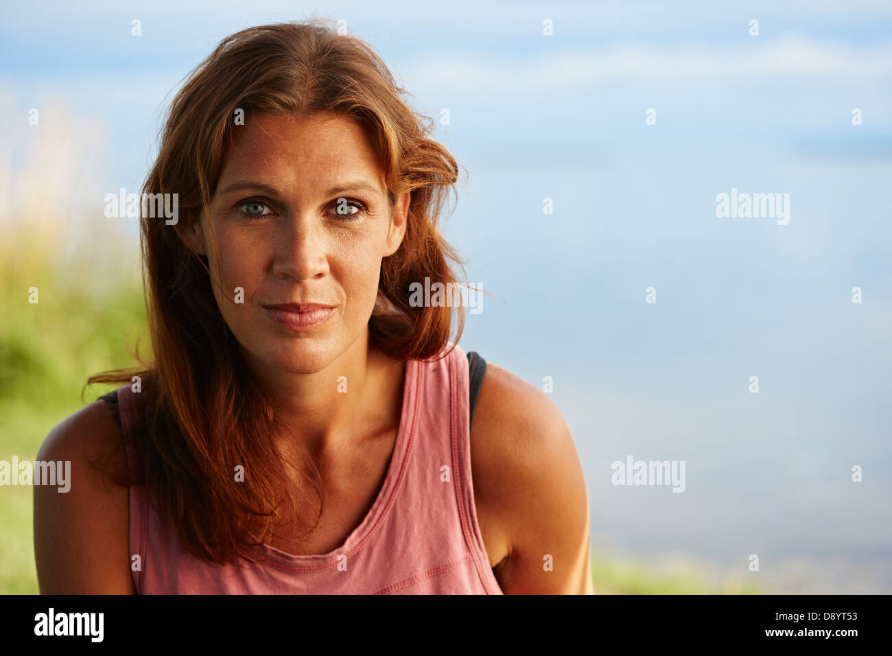 Portrait of mid adult woman Stock Photo - Alamy