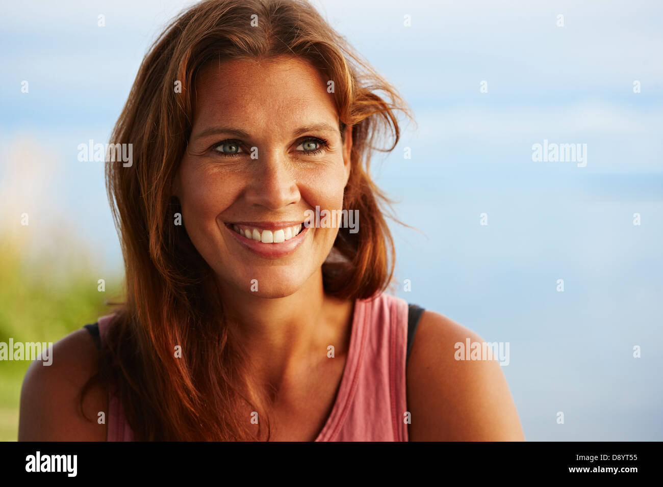 Portrait of mid adult woman Stock Photo - Alamy