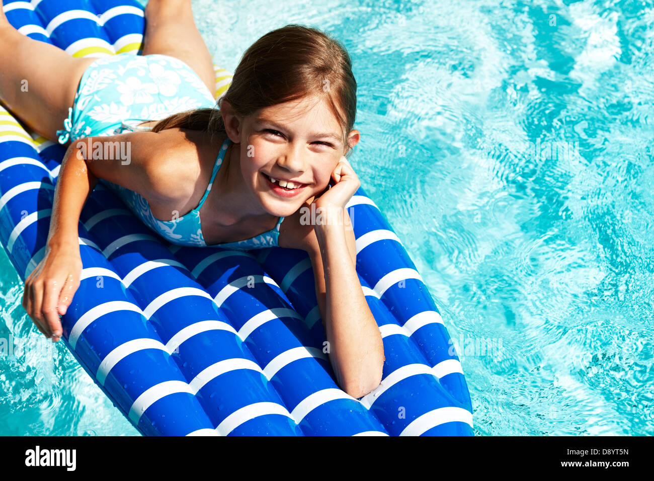 Girl lying on air mattress hi-res stock photography and images - Alamy