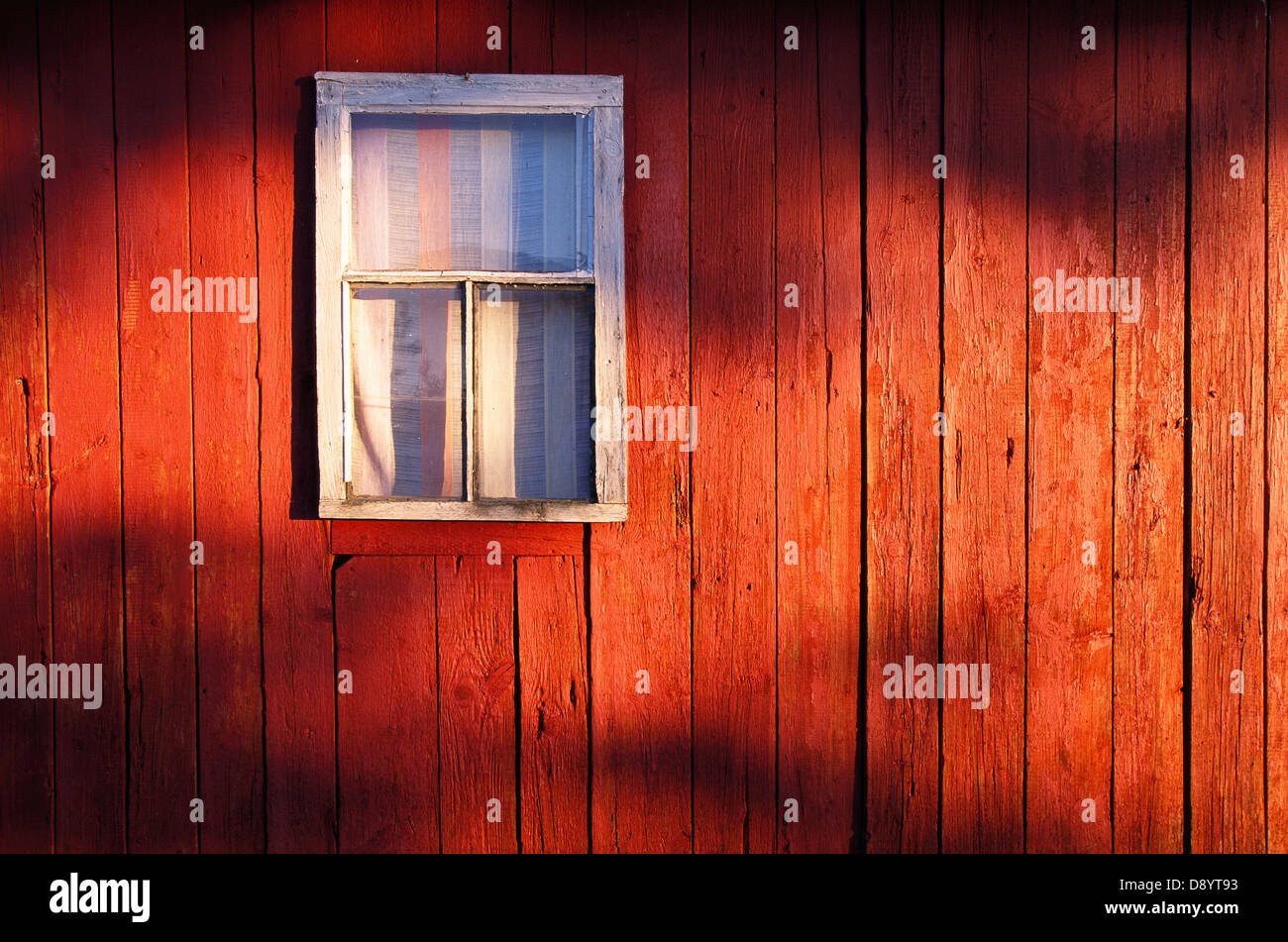 A window on a red house Stock Photo - Alamy